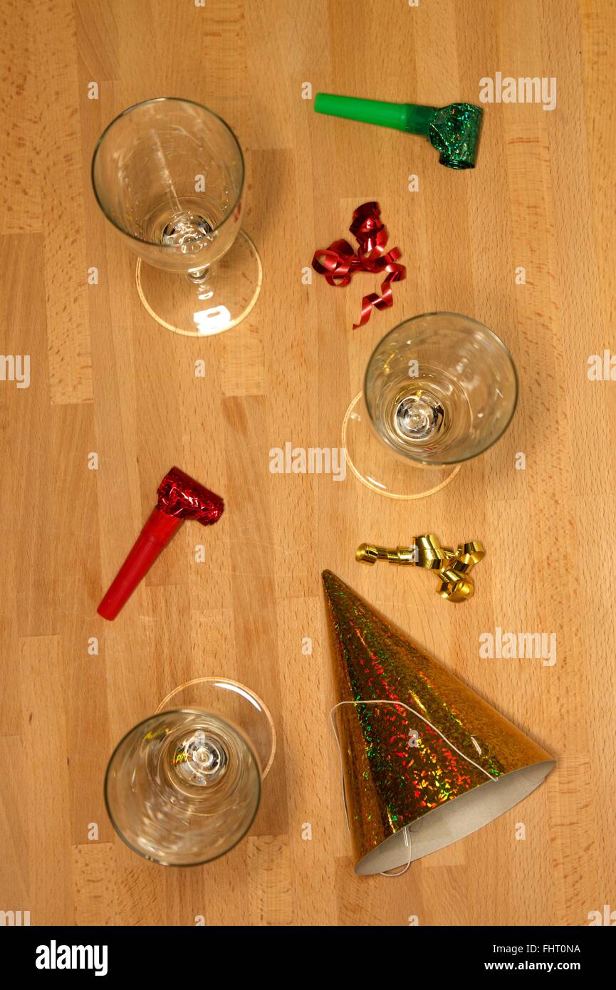 Assorted party items on a wooden floor Stock Photo - Alamy