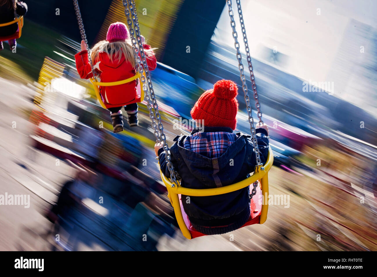 Girl swinging on carousel hi-res stock photography and images - Alamy