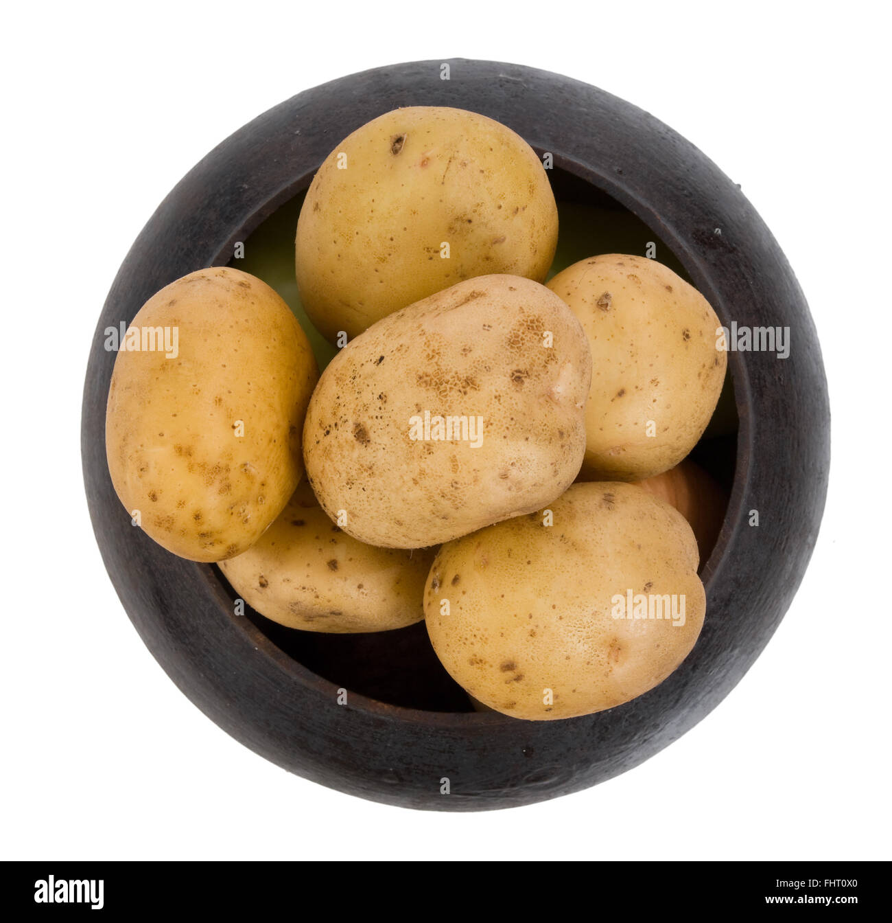 cast iron pot with a potato Stock Photo - Alamy