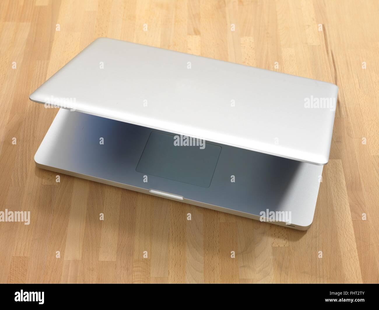 A laptop computer on a work desk Stock Photo - Alamy
