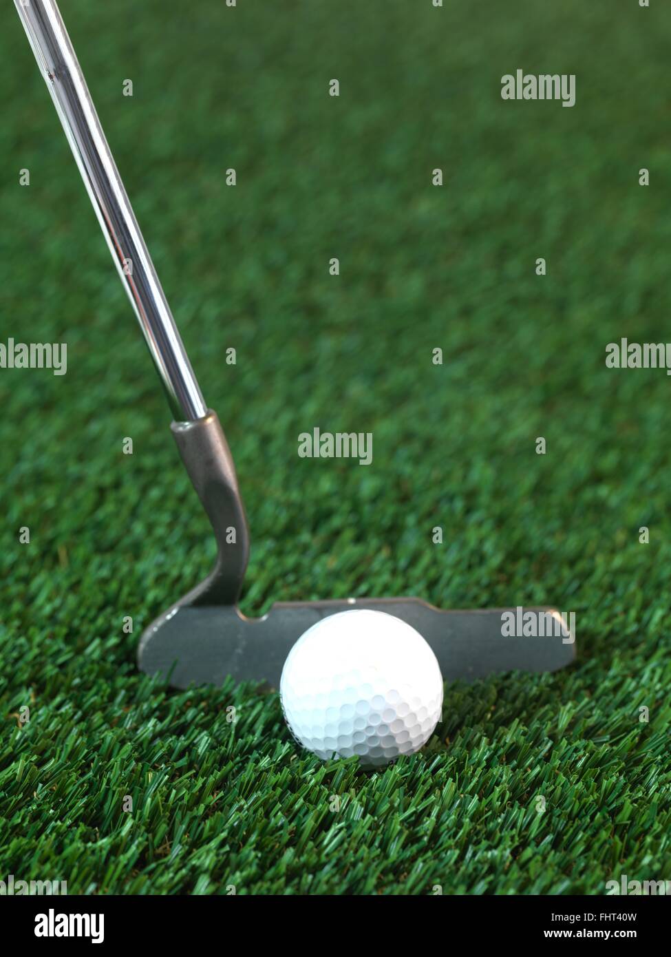Golfing equipment on artficial grass outdoors Stock Photo - Alamy