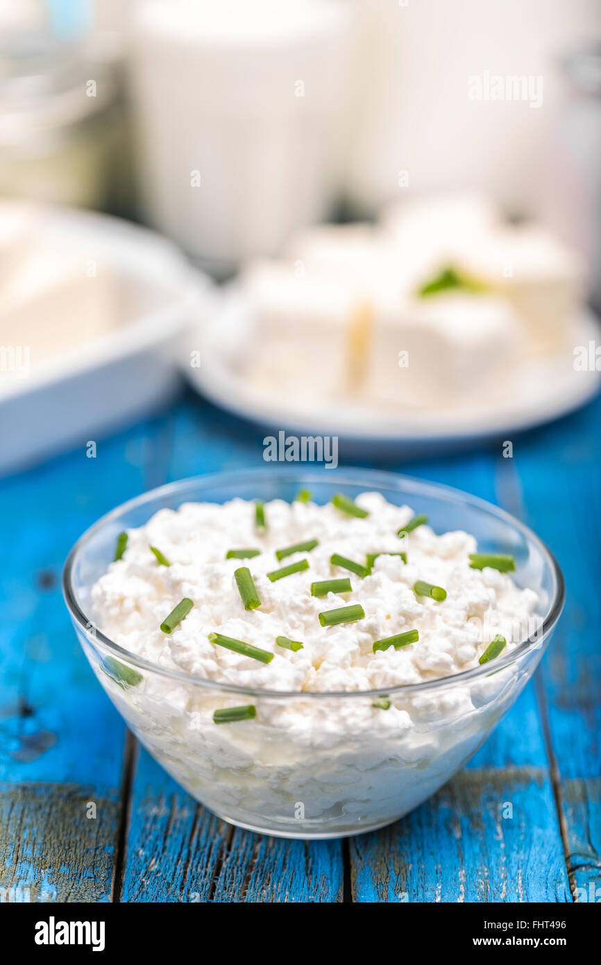 A bowl of cottage cheese with chives Stock Photo - Alamy