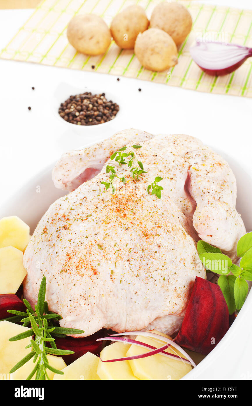 Raw chicken in baking dish Stock Photo - Alamy