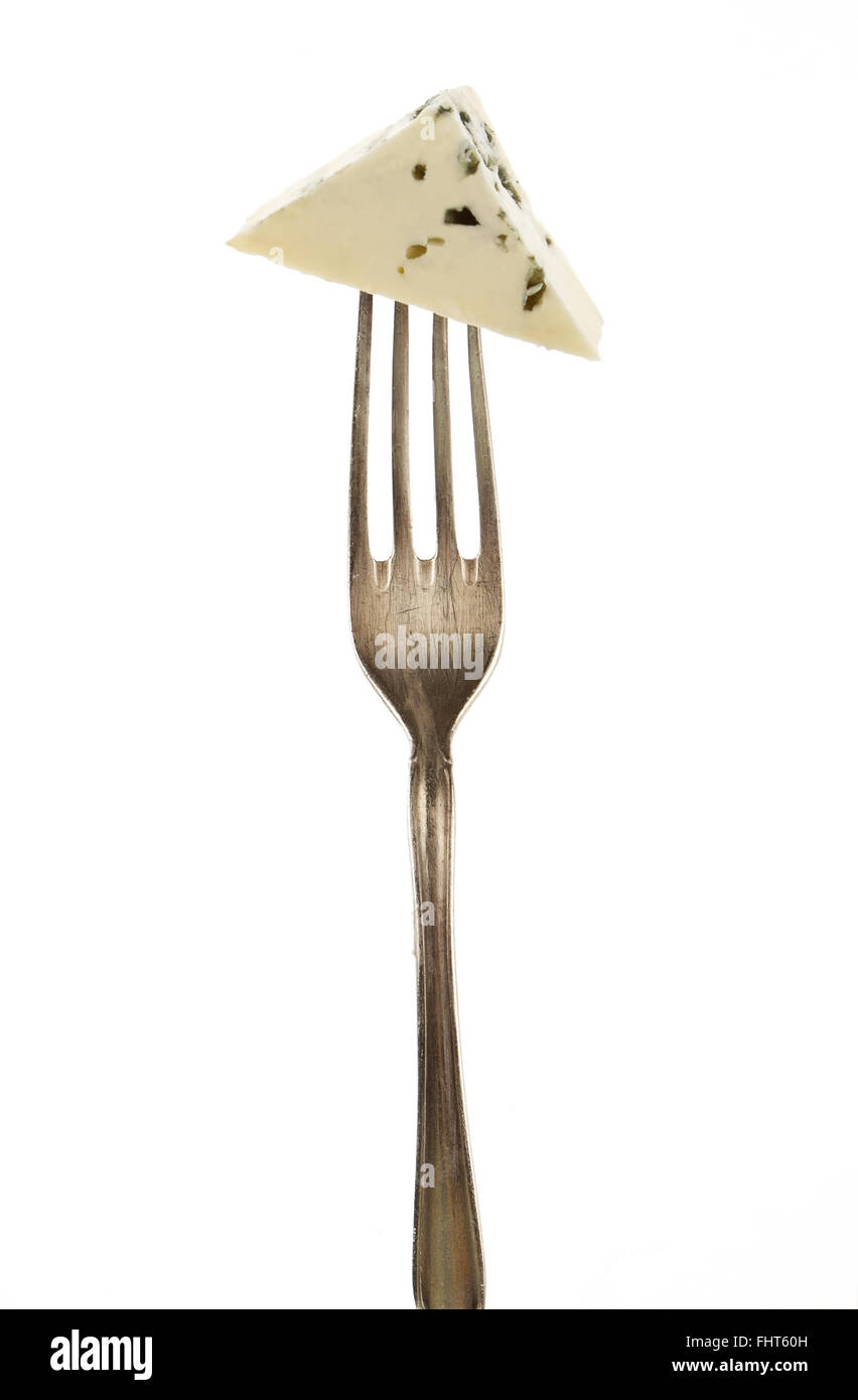 Cheese piece on fork Stock Photo - Alamy