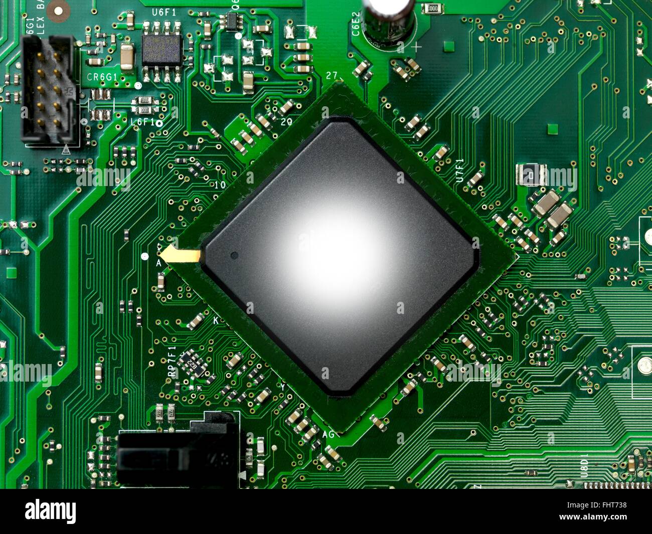 A computer chip on a mother board Stock Photo - Alamy