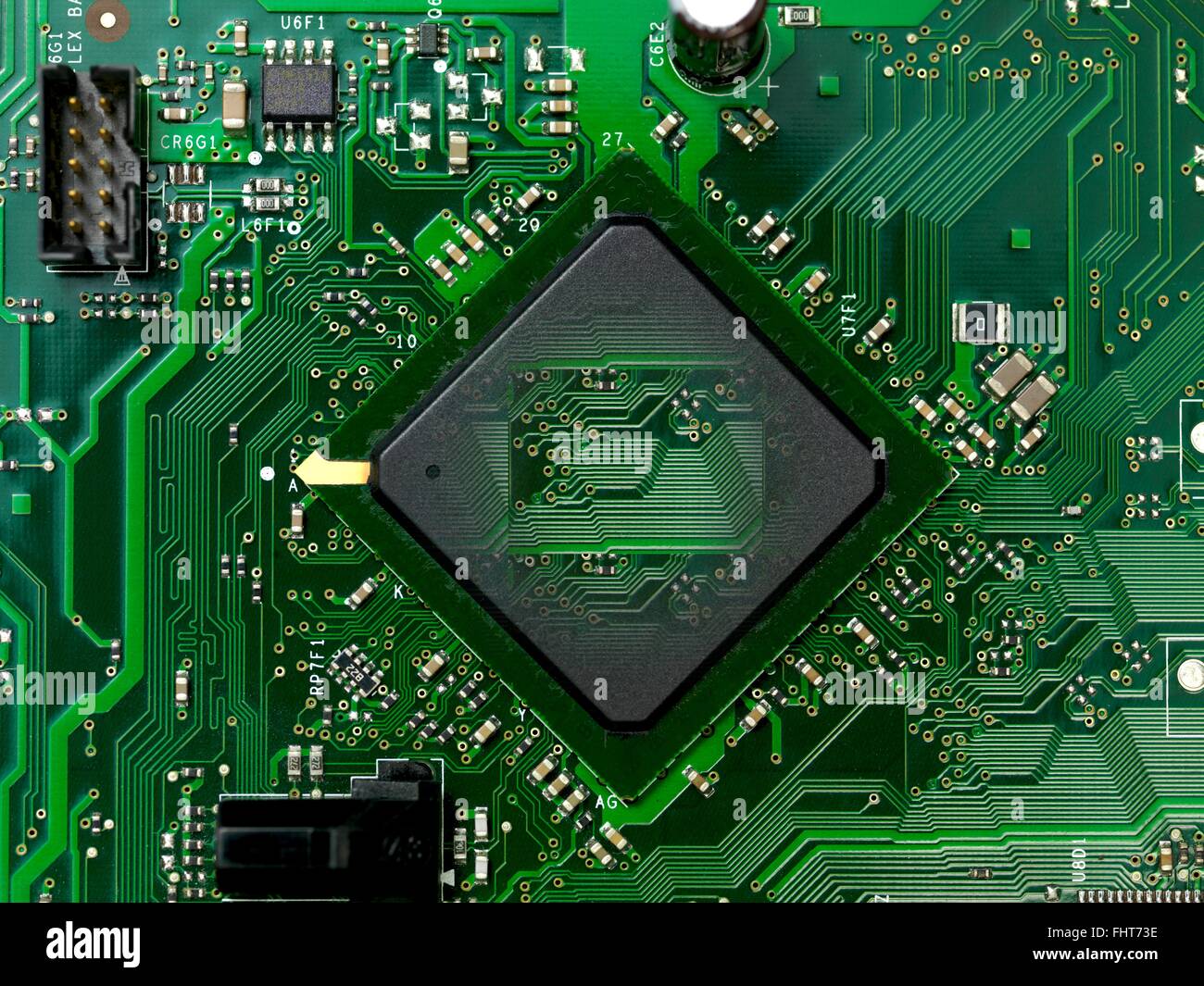 A computer chip on a mother board Stock Photo - Alamy