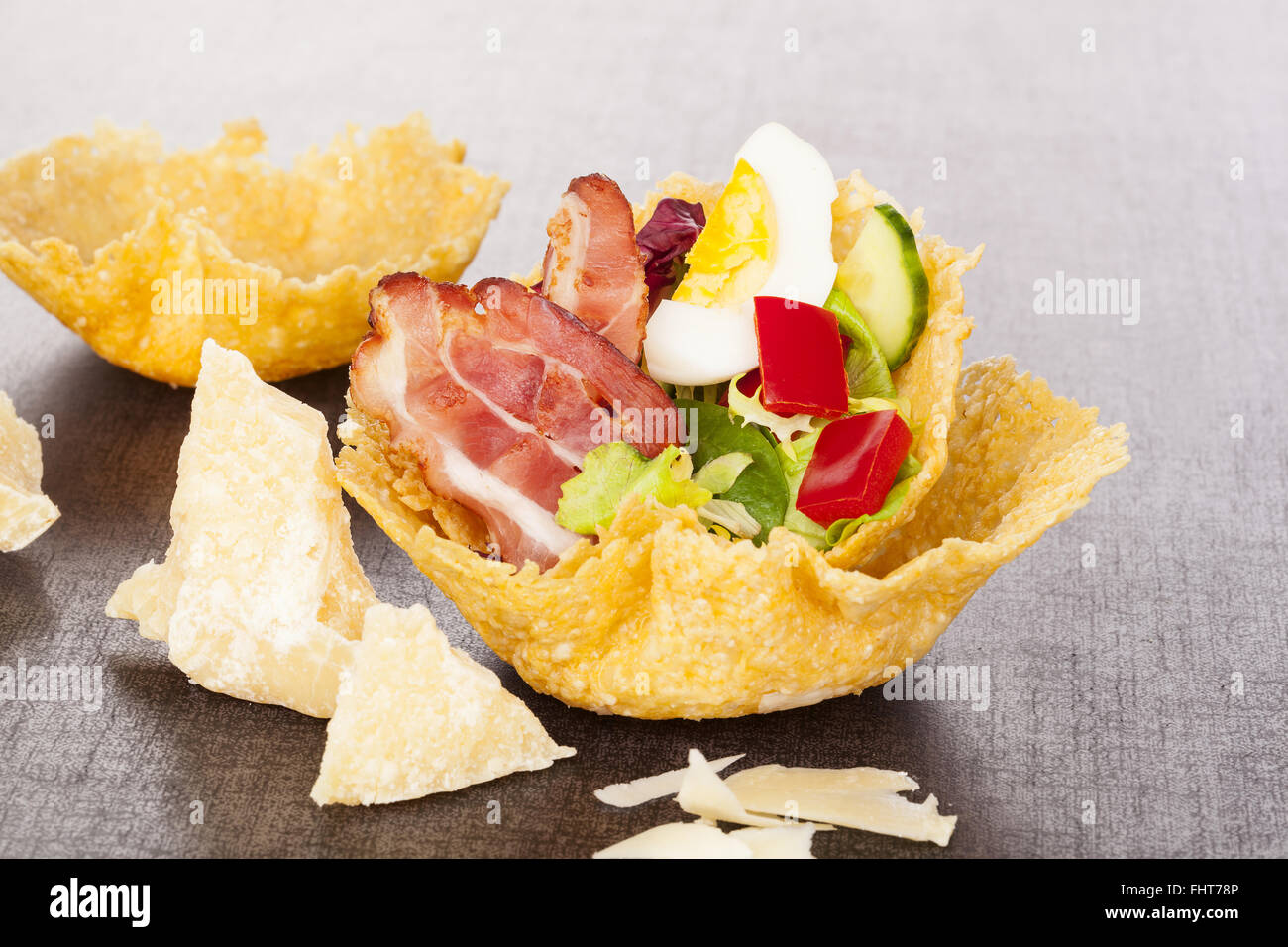 Parmigiano cheese basket Stock Photo - Alamy