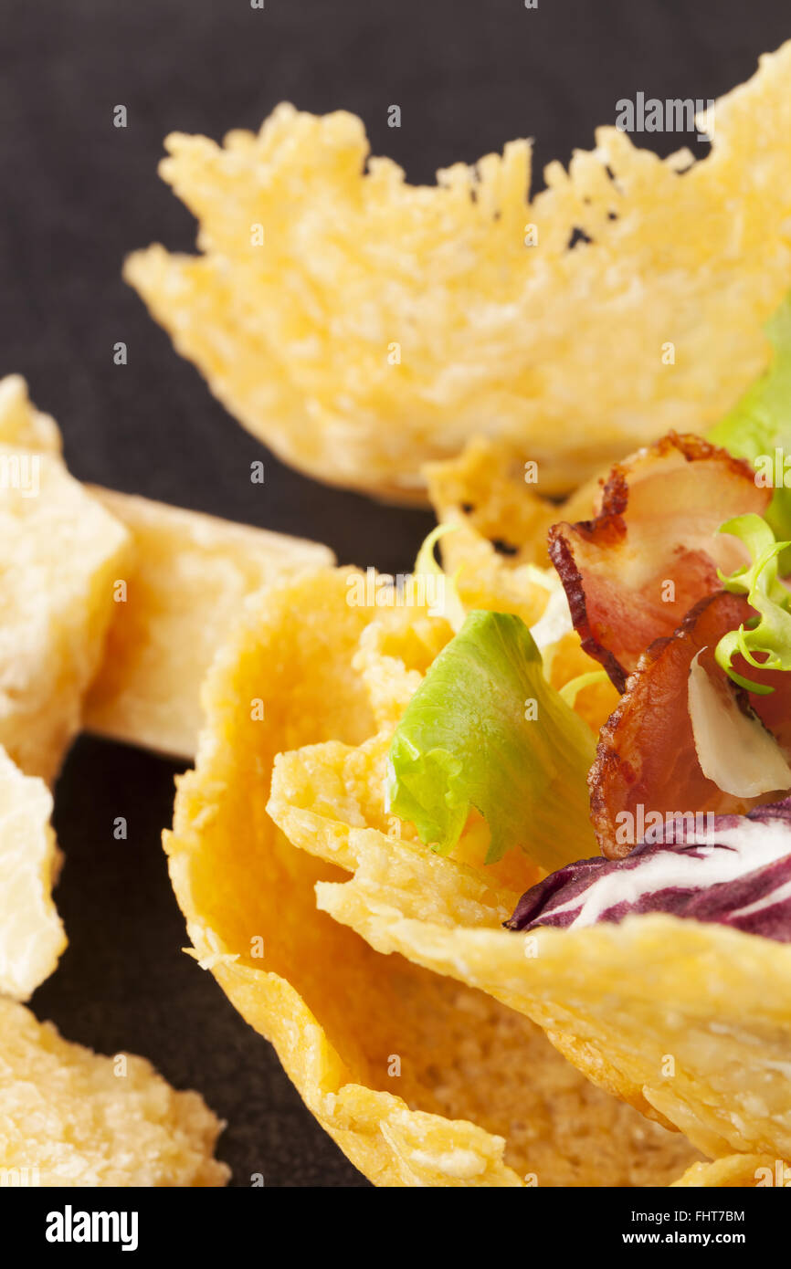 Parmigiano cheese basket Stock Photo - Alamy