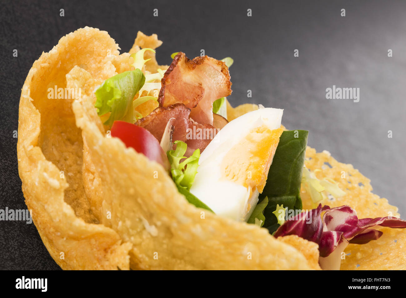 Parmigiano cheese basket Stock Photo - Alamy