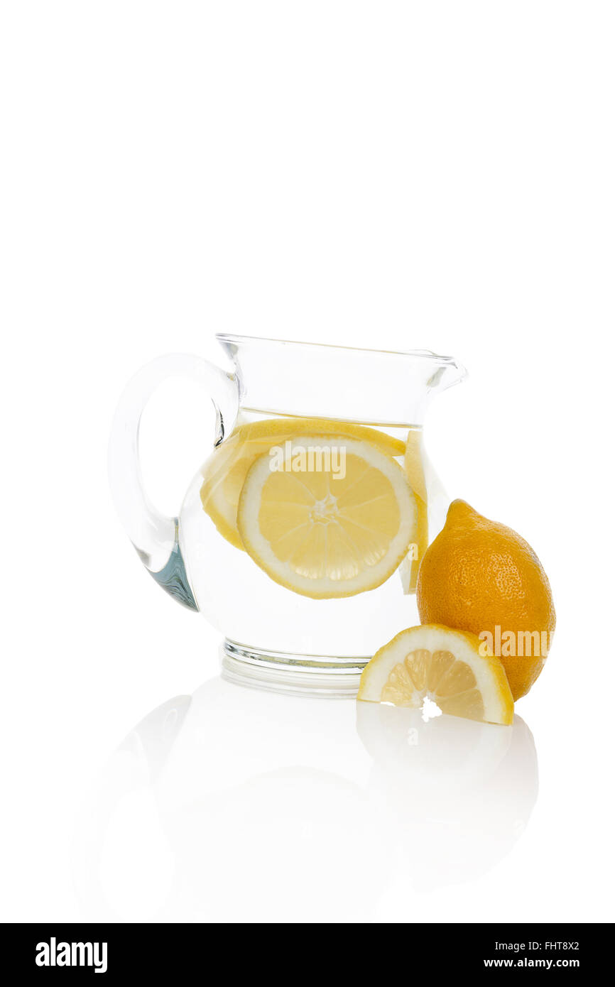 Water with lemon in jar Stock Photo - Alamy