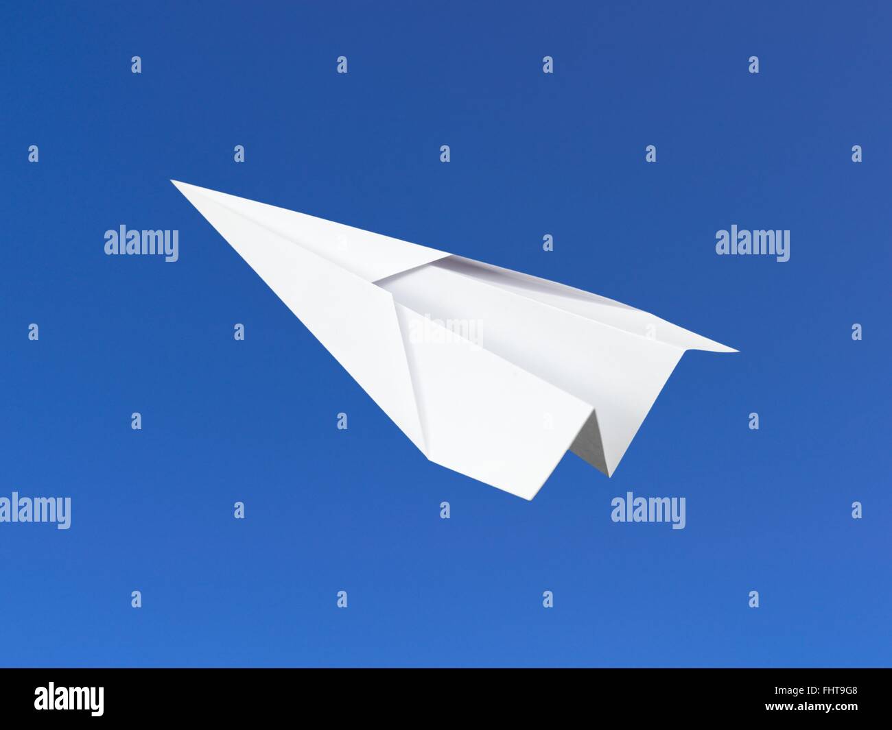 A paper plane in the sky Stock Photo - Alamy