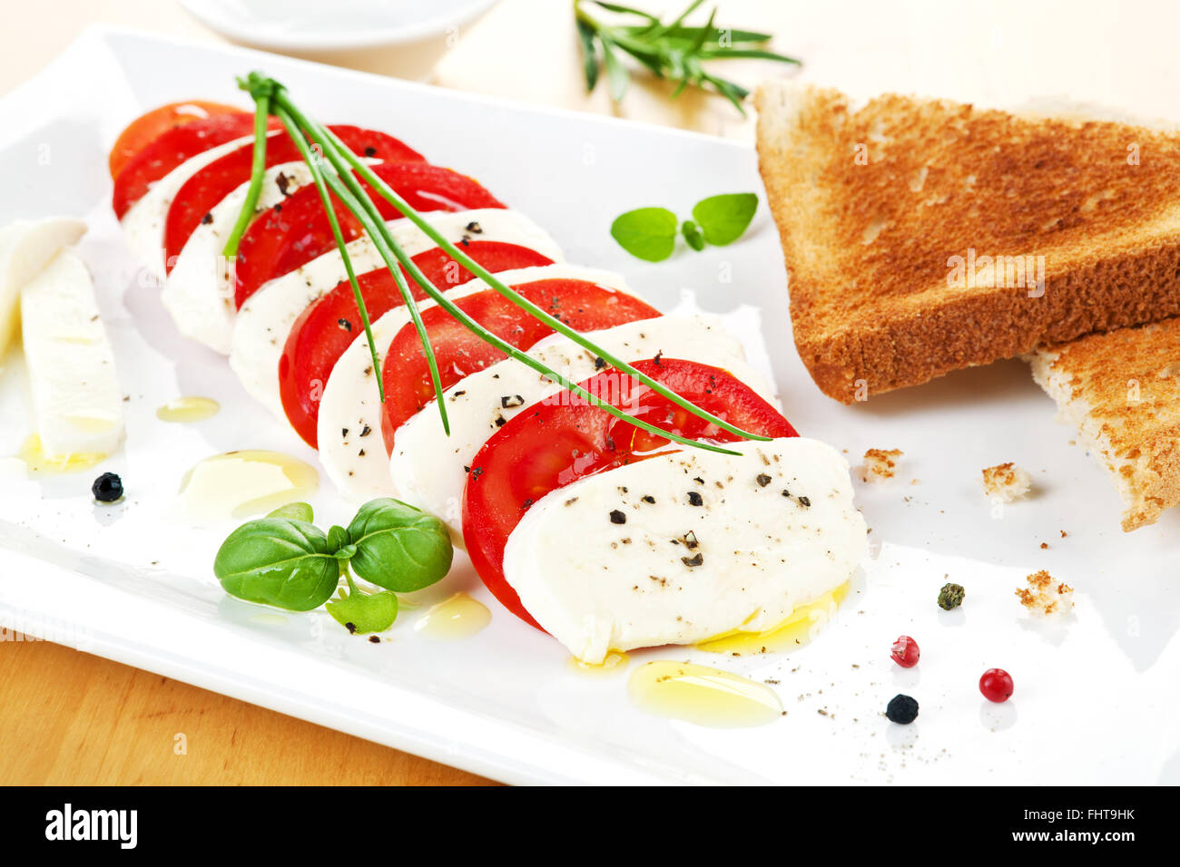 Tomato mozzarella plate Stock Photo - Alamy