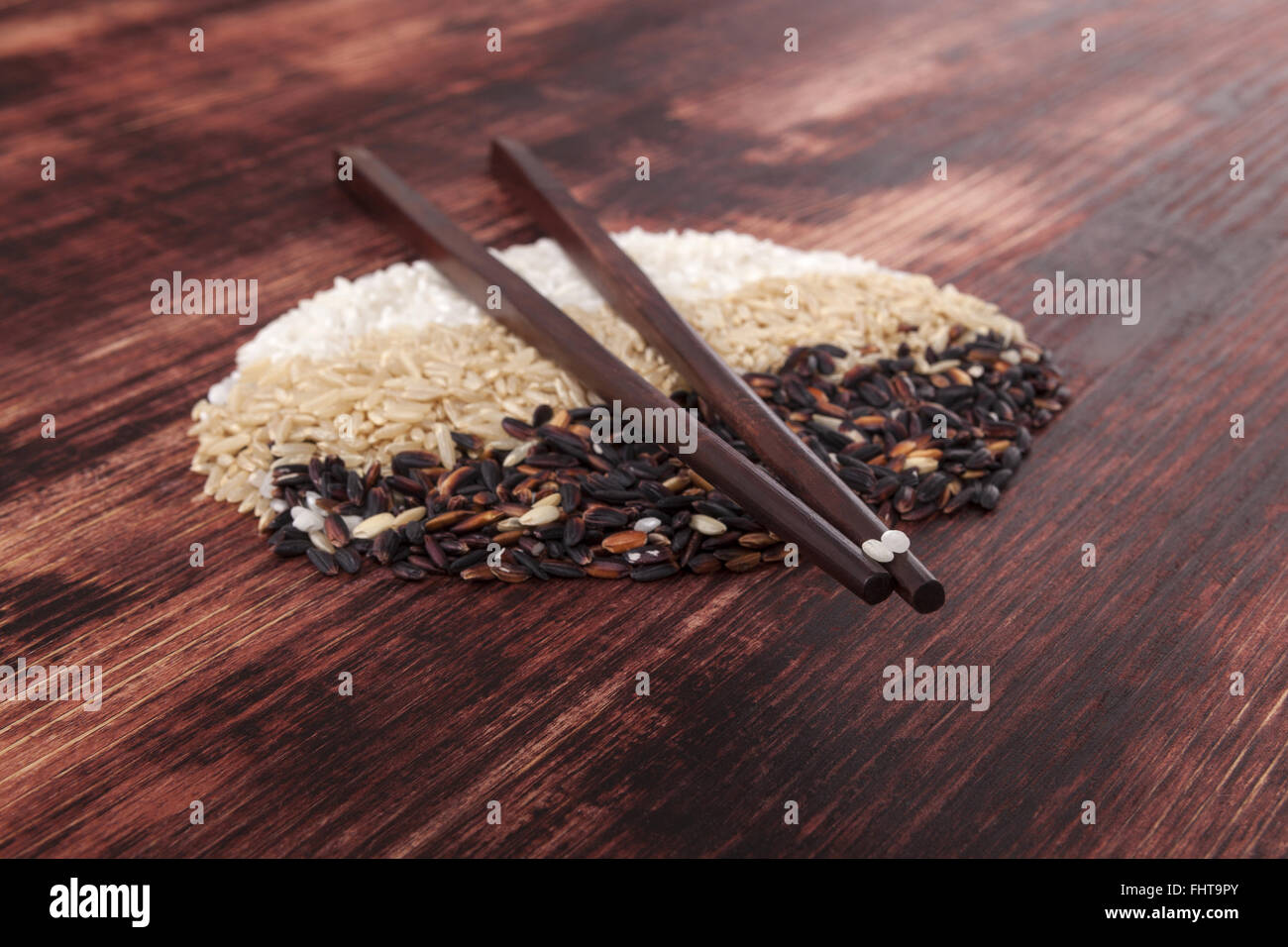 Mixed rice with chopsticks Stock Photo - Alamy