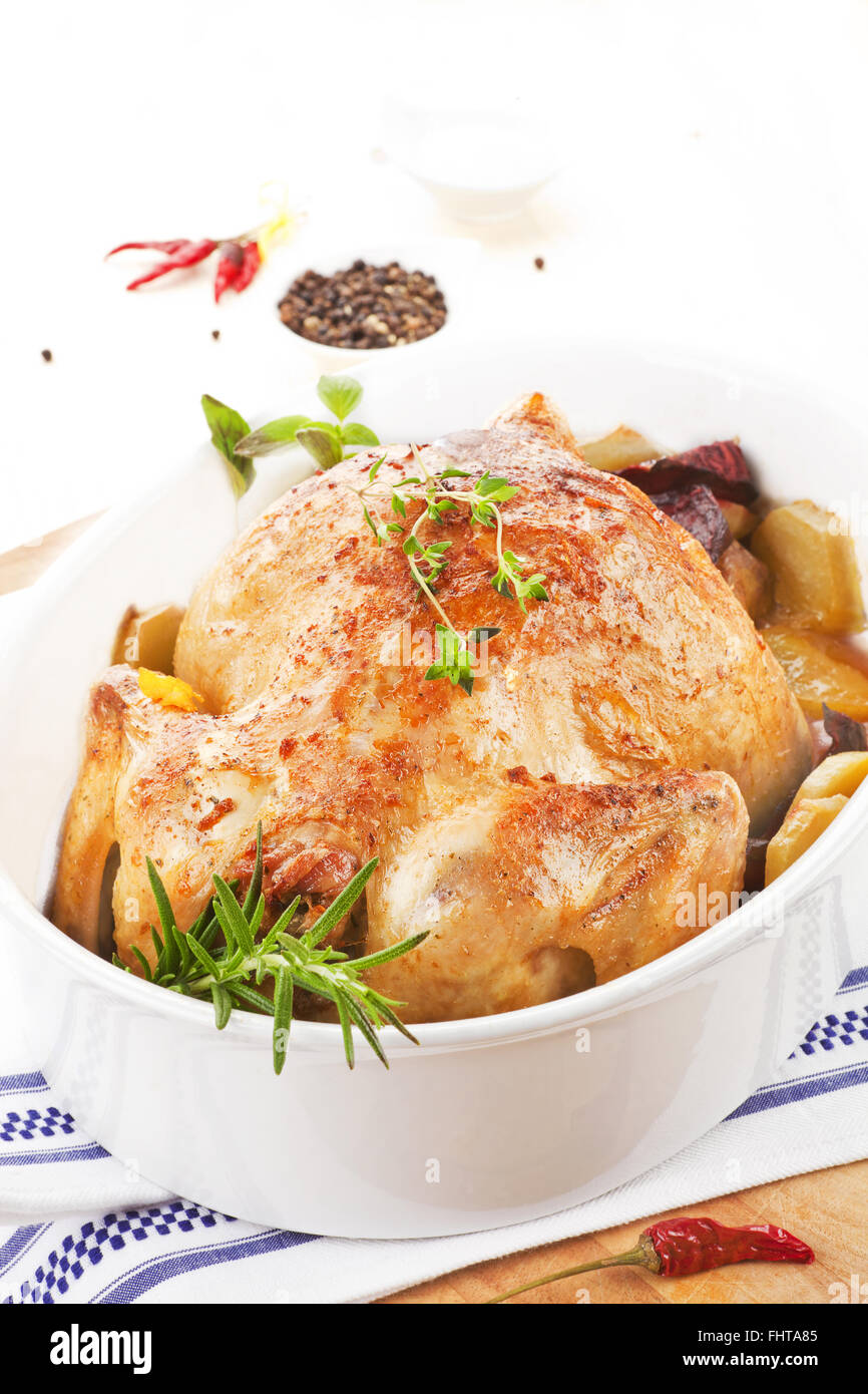 Golden chicken in baking dish Stock Photo - Alamy