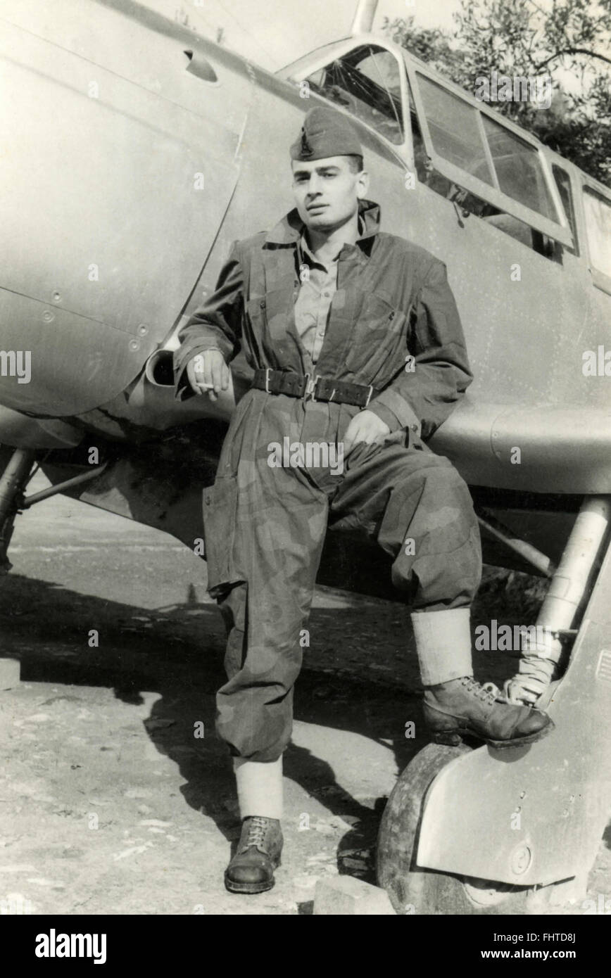 A soldier leaning on a plane, Italy Stock Photo - Alamy