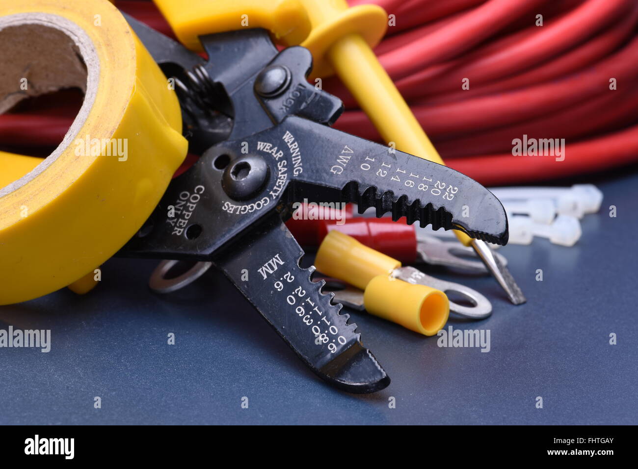 Tools for electrician and cables on metal surface Stock Photo - Alamy