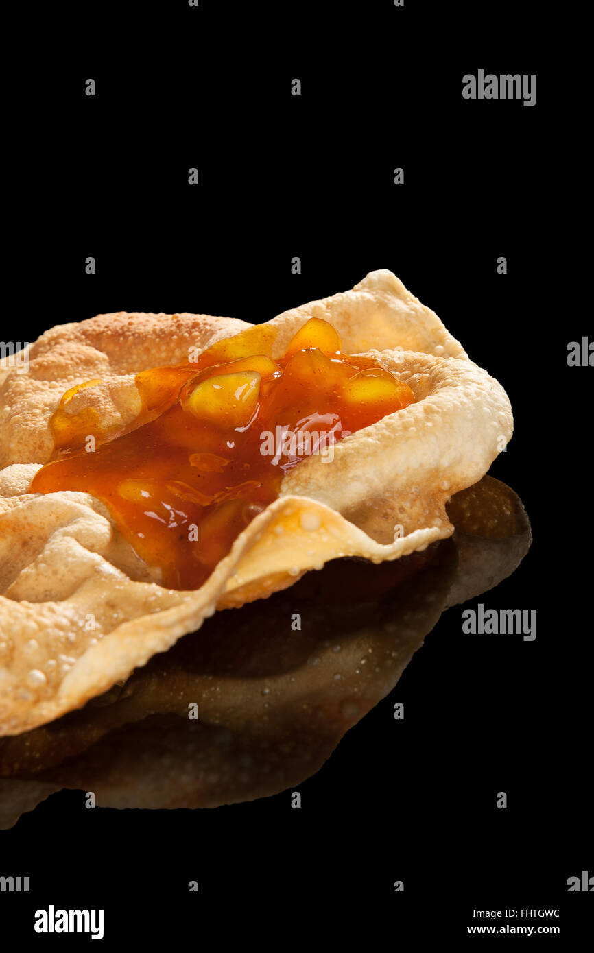 Pappadum isolated on black Stock Photo - Alamy