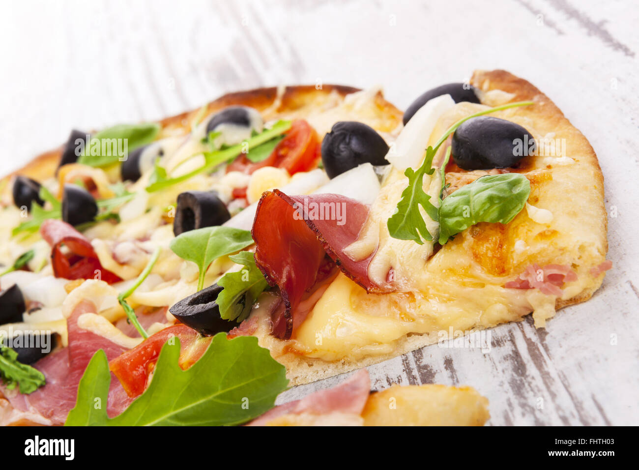 Delicious pizza detail Stock Photo - Alamy