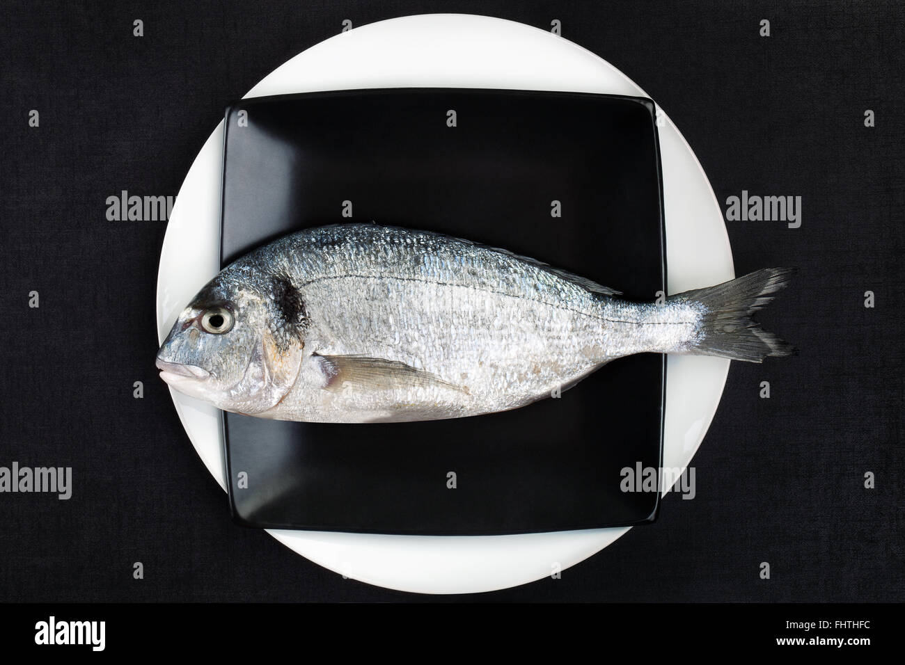 Fish on plate Stock Photo - Alamy