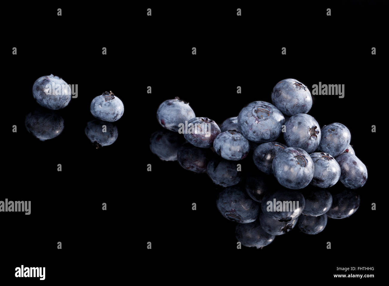 Blueberries isolated on black Stock Photo - Alamy