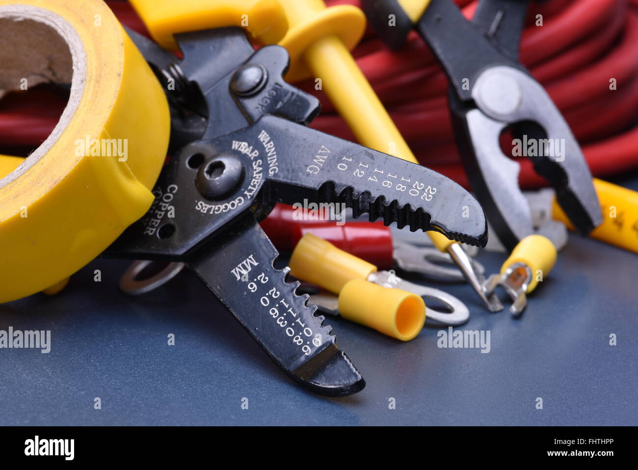 Tools for electrician and cables on metal surface Stock Photo - Alamy