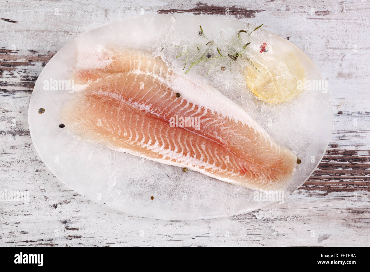 Frozen fish fillet Stock Photo - Alamy