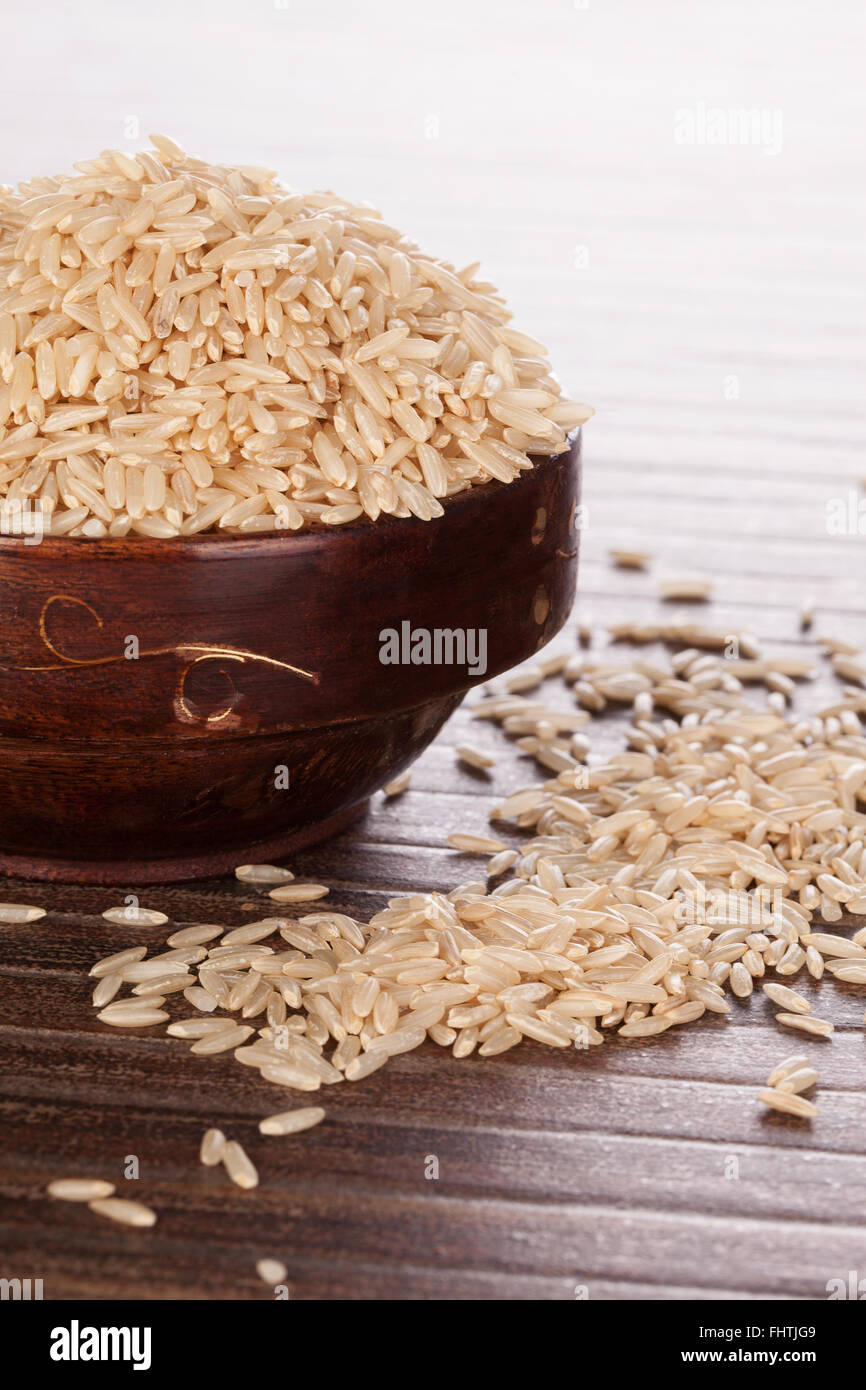 Brown rice background Stock Photo - Alamy