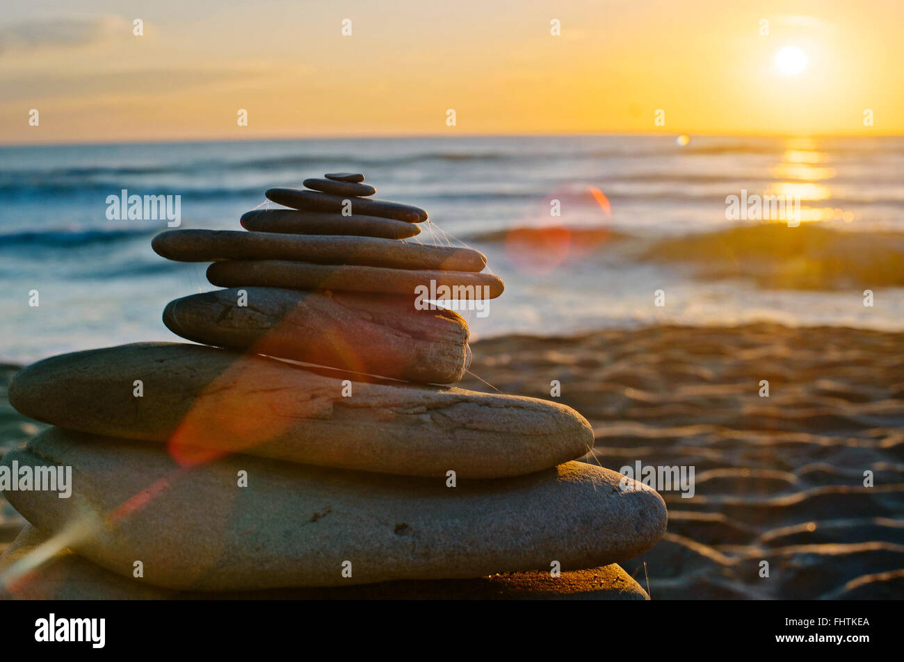 Pebbles balanced on top of each other hi-res stock photography and ...