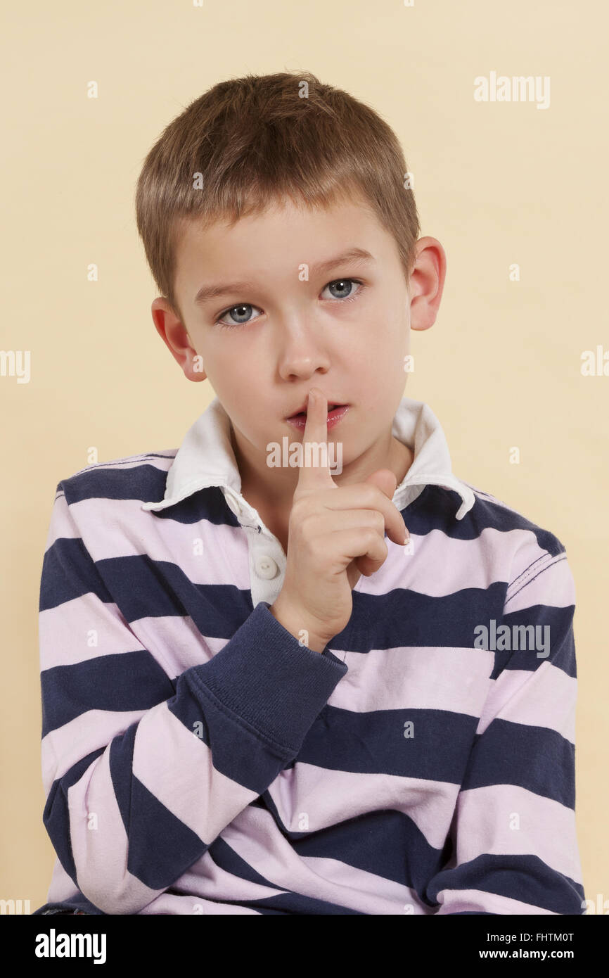 Finger on lips Stock Photo - Alamy