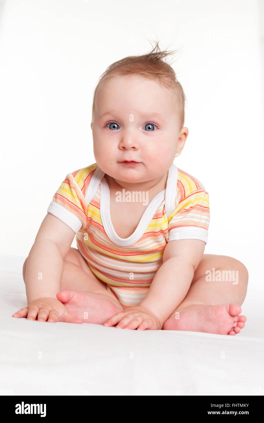 Baby looking into the camera Stock Photo - Alamy