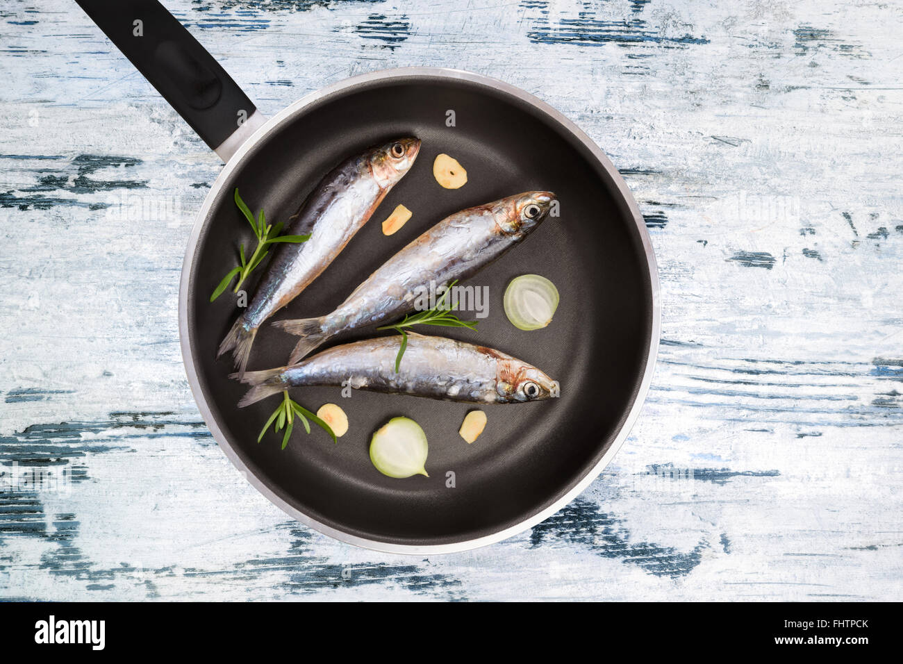 Raw fish on pan Stock Photo - Alamy