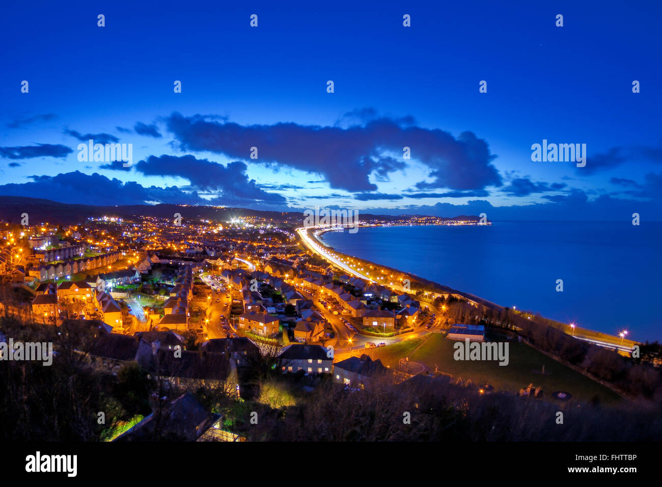 Light trails from vehicles passing through Colwyn Bay along the A55 ...