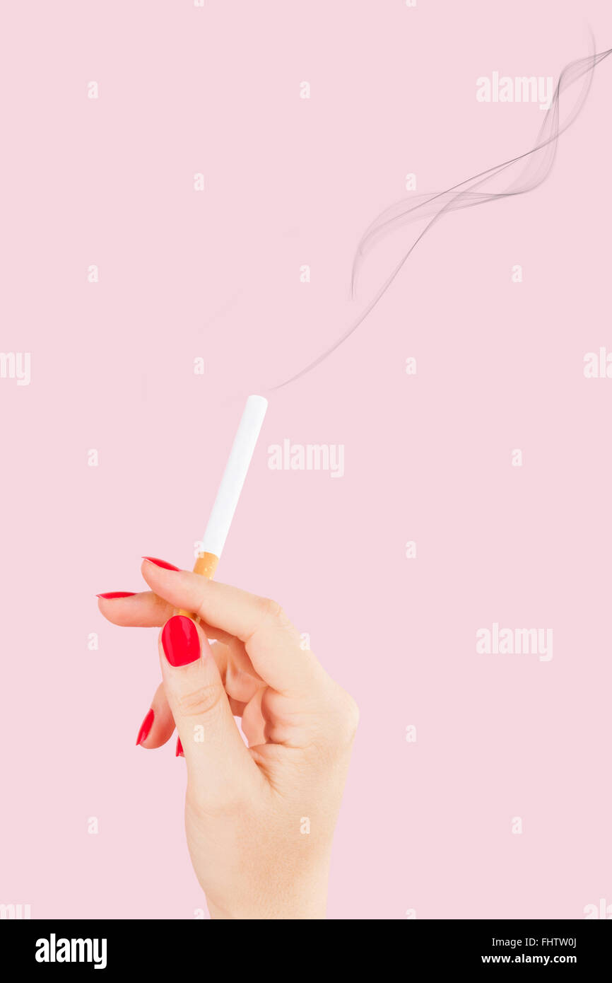 Woman smoking cigarette pink hi-res stock photography and images - Alamy
