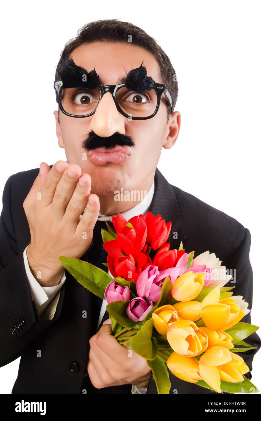 Funny man with flowers isolated on white Stock Photo - Alamy