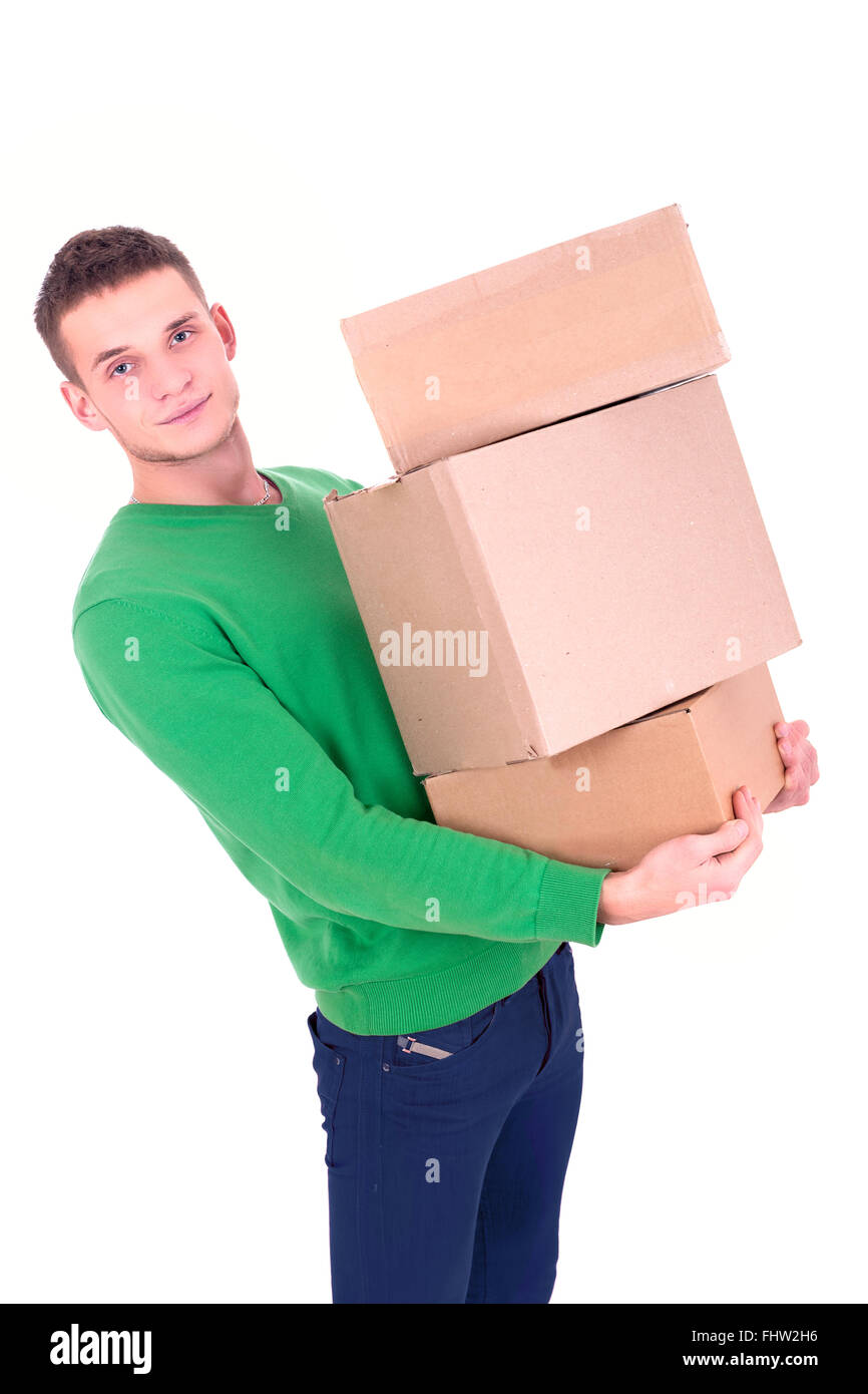 Handsome attractive young man holding cardboard boxes in his hands ...