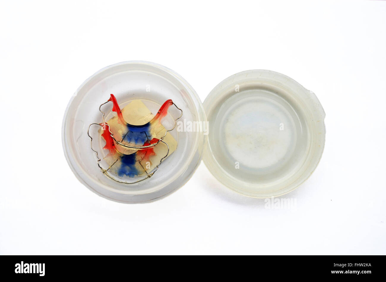 Retainer fashion in white plastic box Stock Photo - Alamy