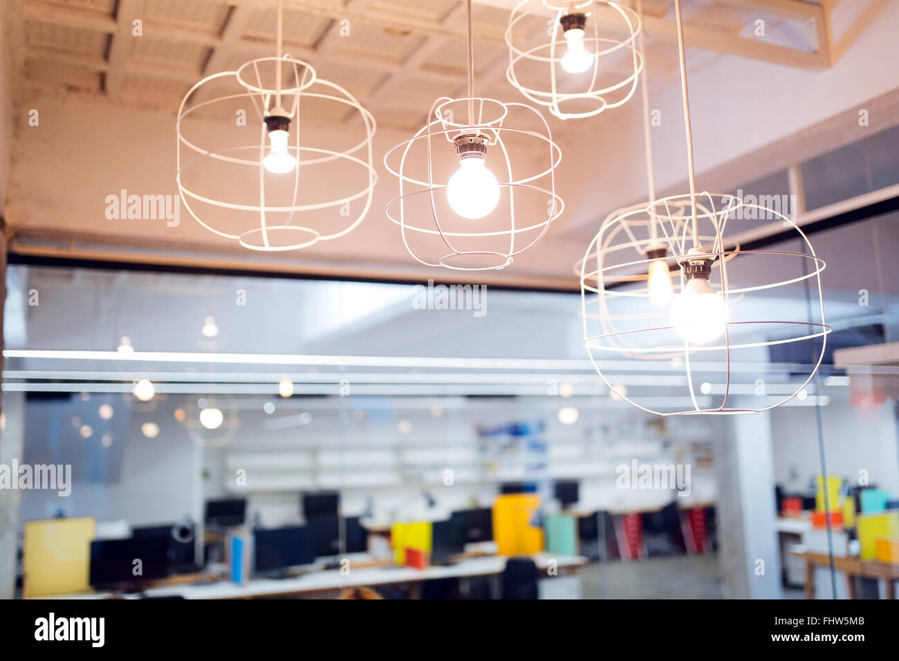 Hanging modern decorative light bulbs Stock Photo - Alamy