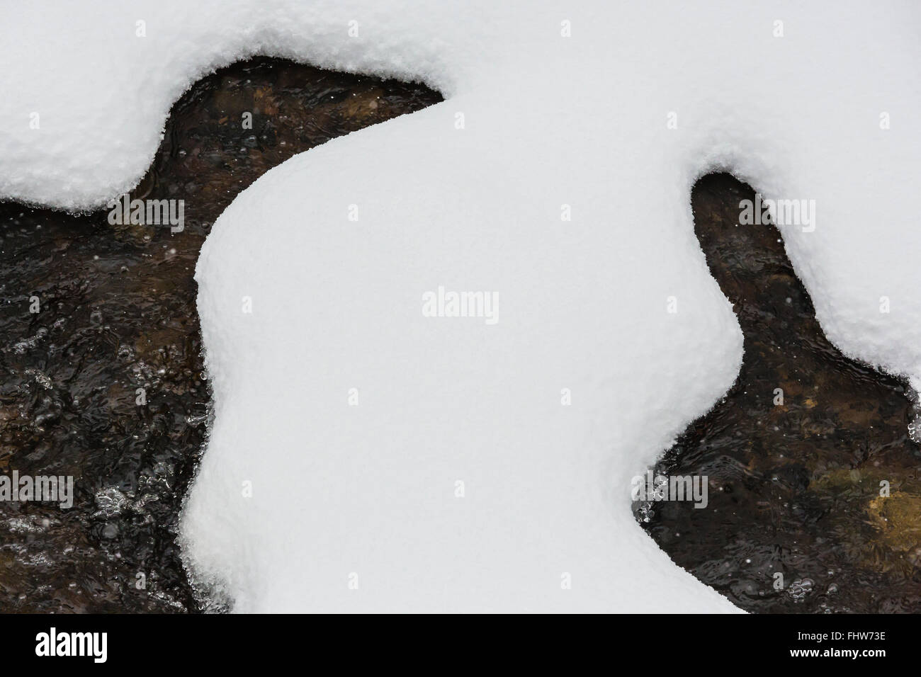 Forms naturally sculpted of ice and snow along trail to Munising Falls ...