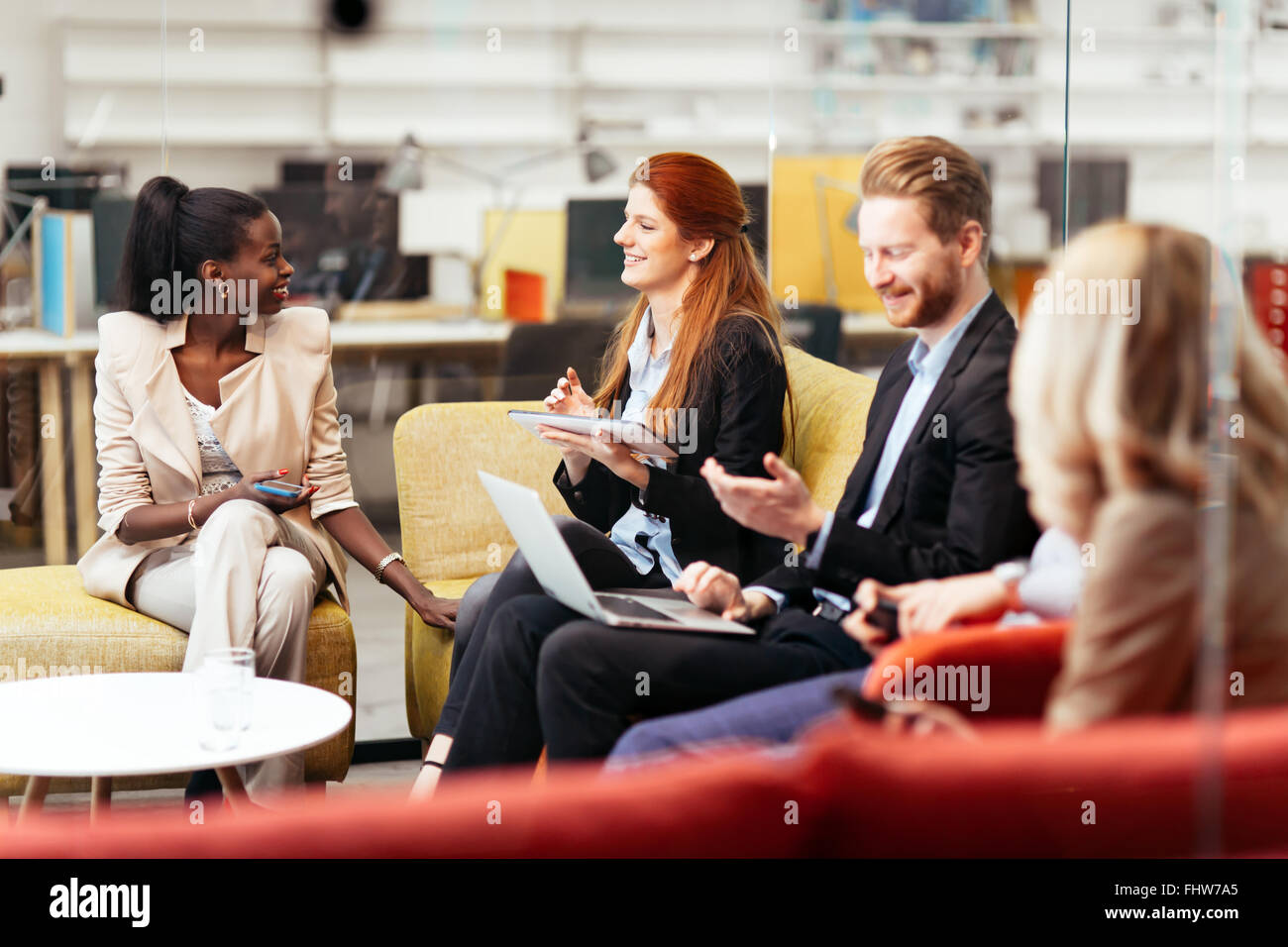 Business people conversation with technology at hand. Exchange of new ...