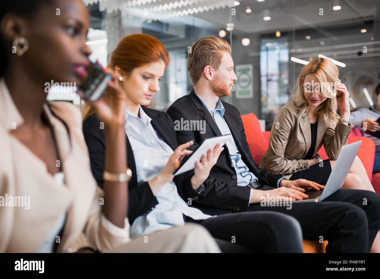 Business people conversation with technology at hand. Exchange of new ...