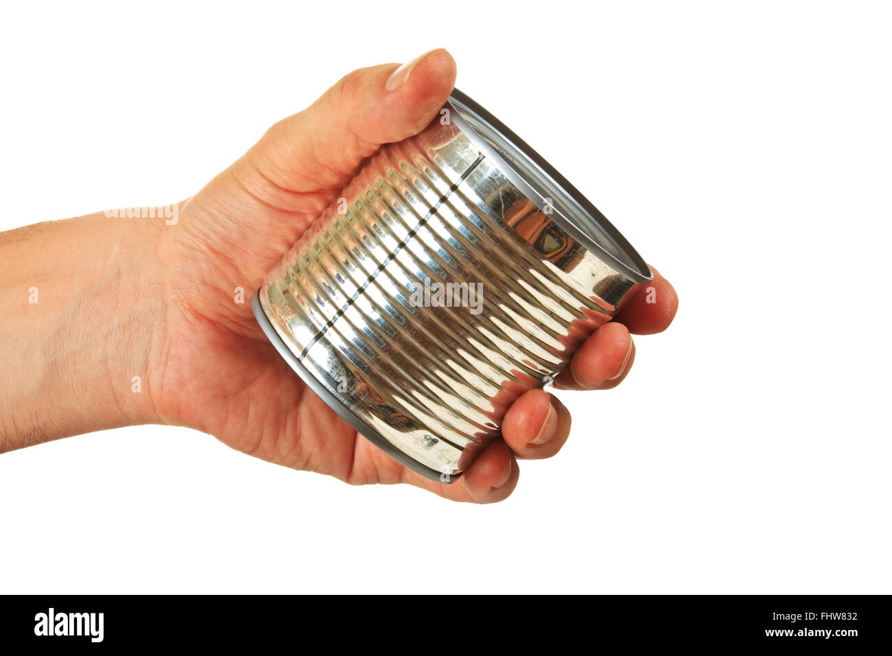 Food can in hand Stock Photo - Alamy