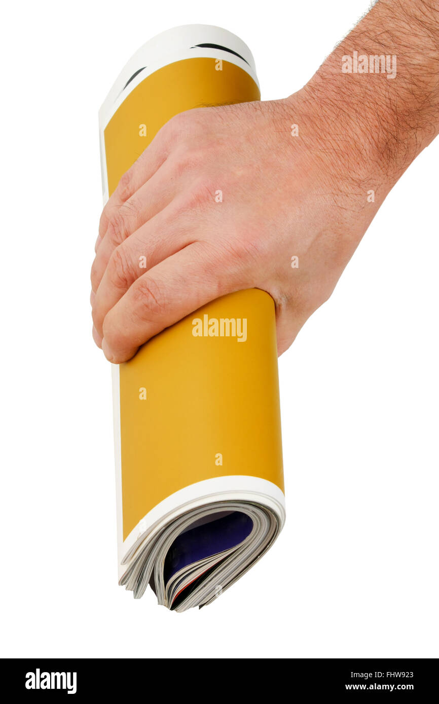 magazine in hand Stock Photo - Alamy