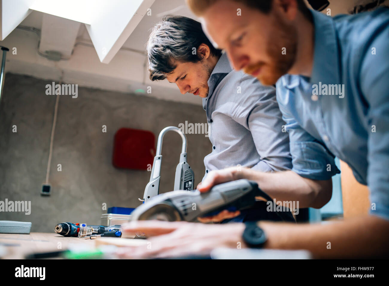 Joiners working with wood and being creative Stock Photo - Alamy