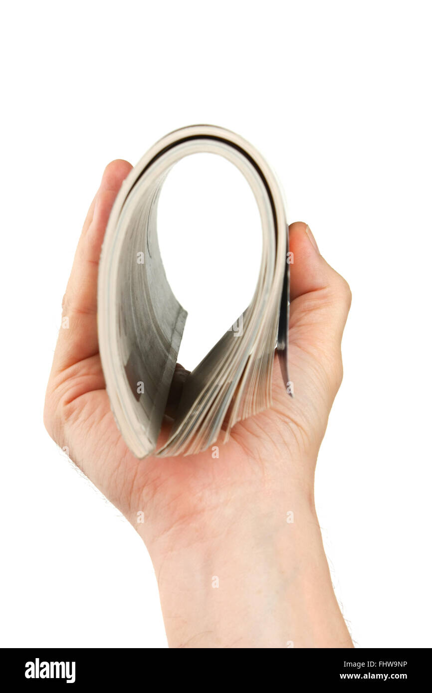 magazine in hand Stock Photo - Alamy