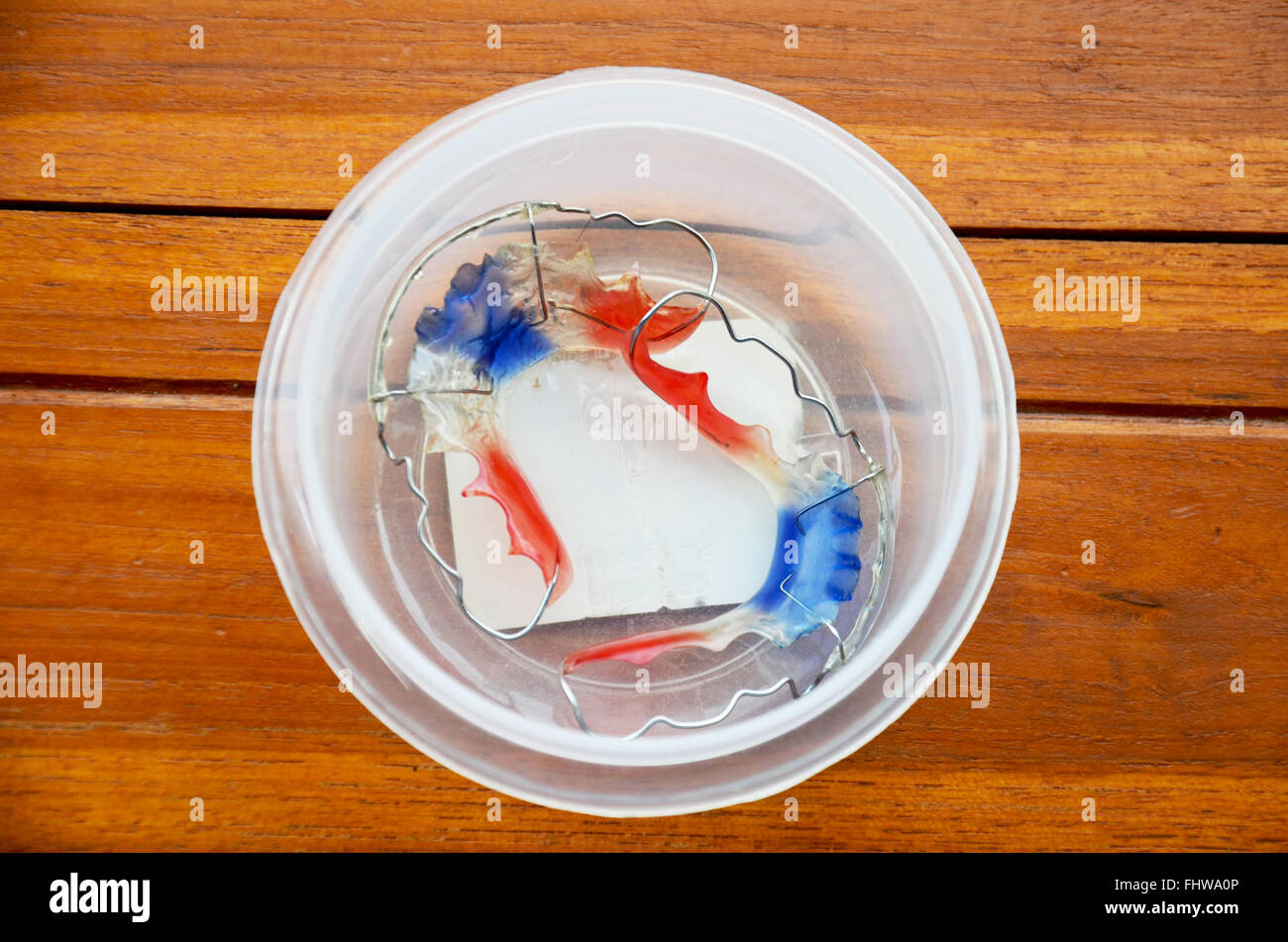 Retainer fashion in white plastic box Stock Photo - Alamy