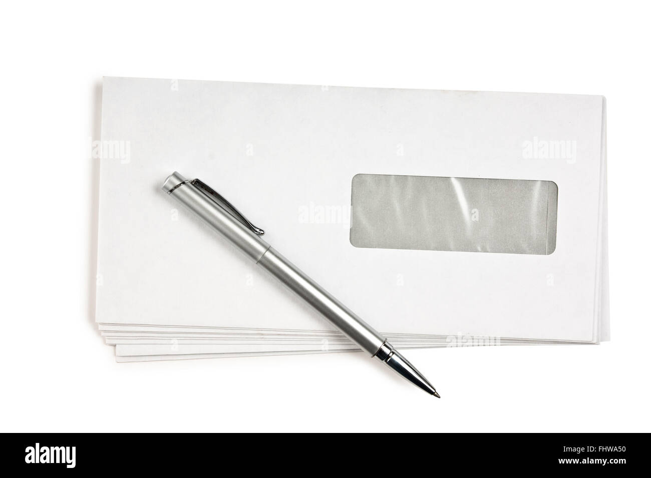 stack of mail envelopes and a pen Stock Photo - Alamy