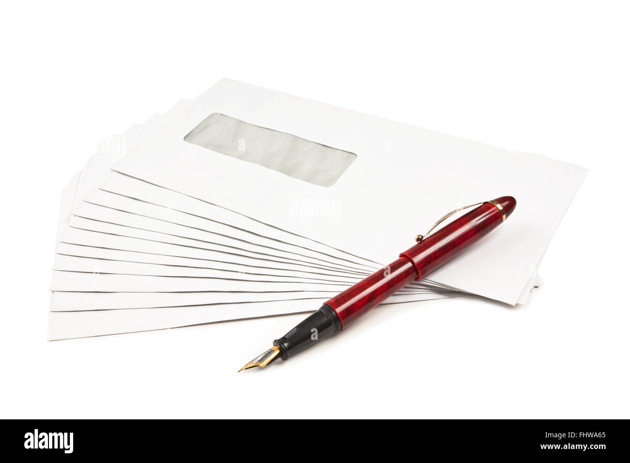 stack of mail envelopes and a pen Stock Photo - Alamy