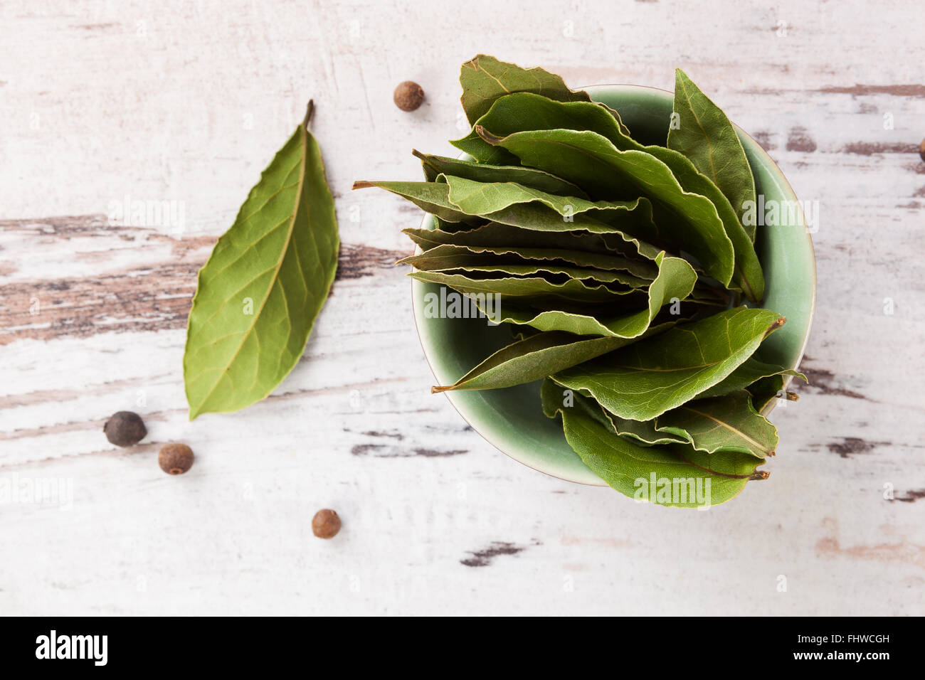 Bay leaves background Stock Photo - Alamy