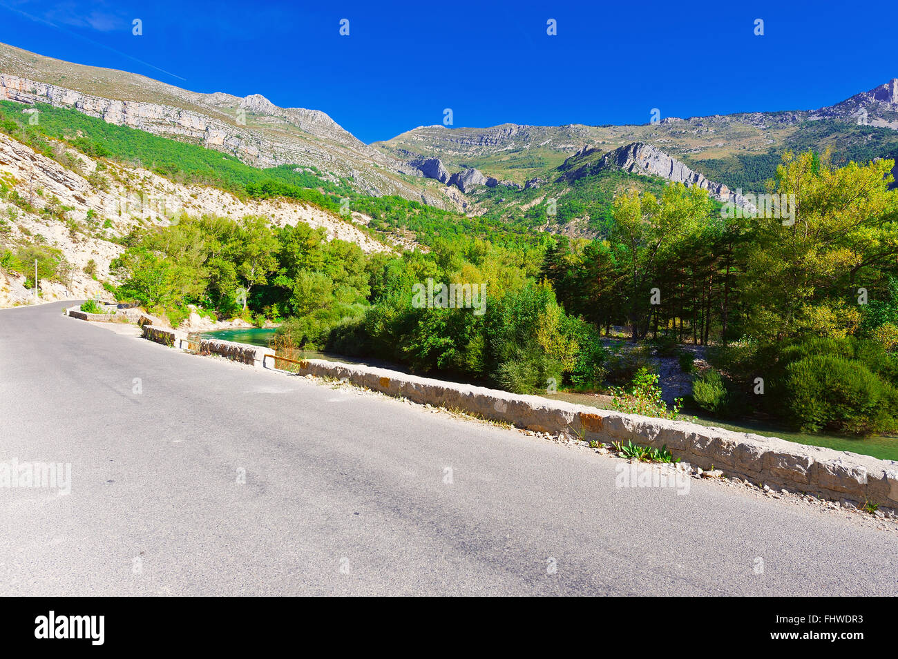 Road along mountain river hi-res stock photography and images - Alamy