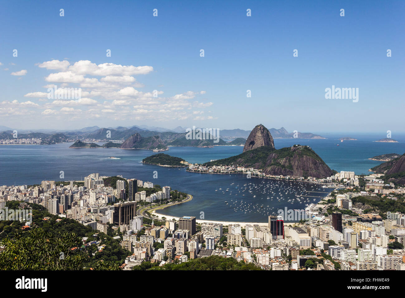 Beach and cove of Botafogo in Guanabara Bay with Pao de Acucar and ...